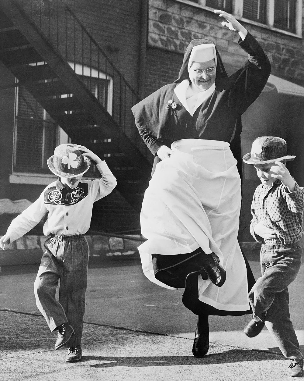 Nun Dancing With Children – Poster Master